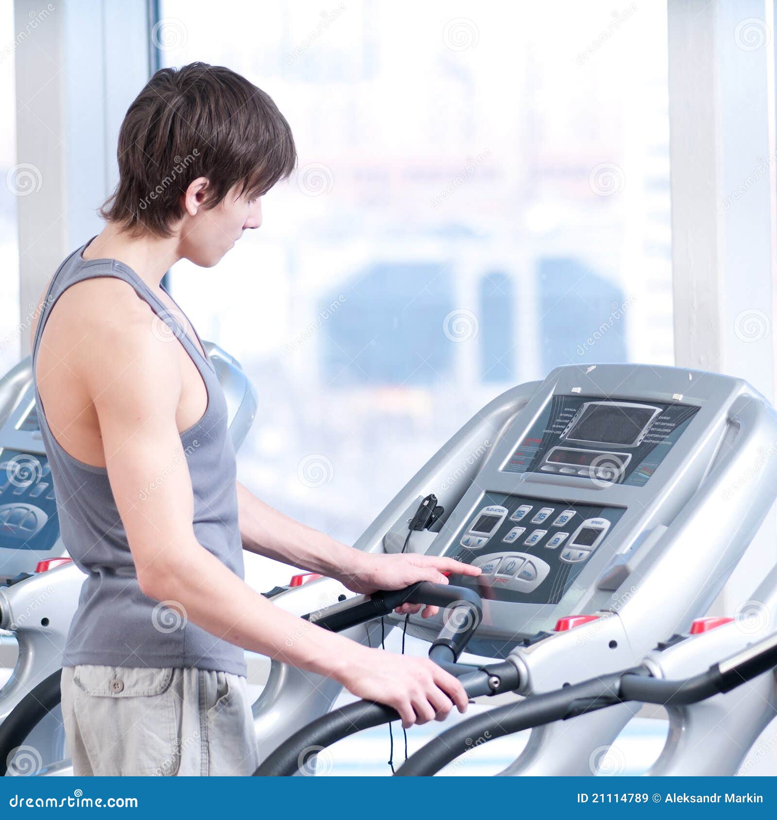 Young Man at the Gym Exercising. Running Stock Image - Image of ...