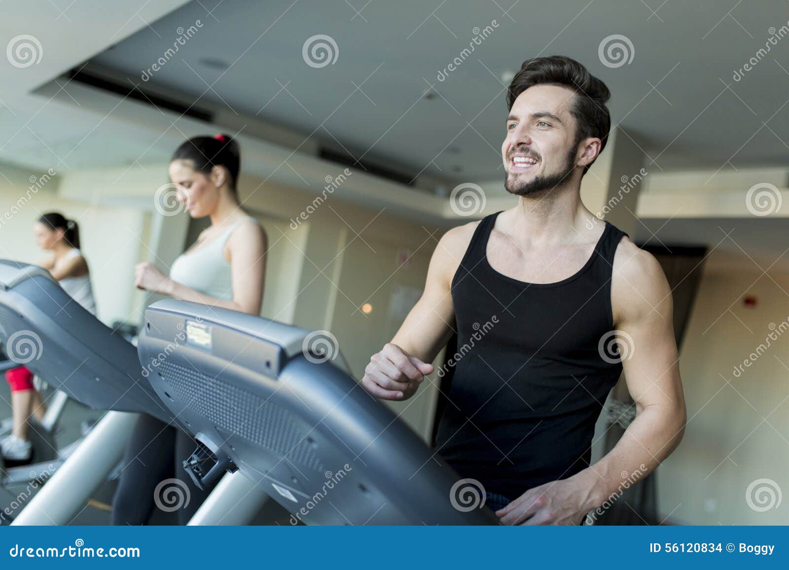Young man in the gym stock photo. Image of shape, treadmill - 56120834