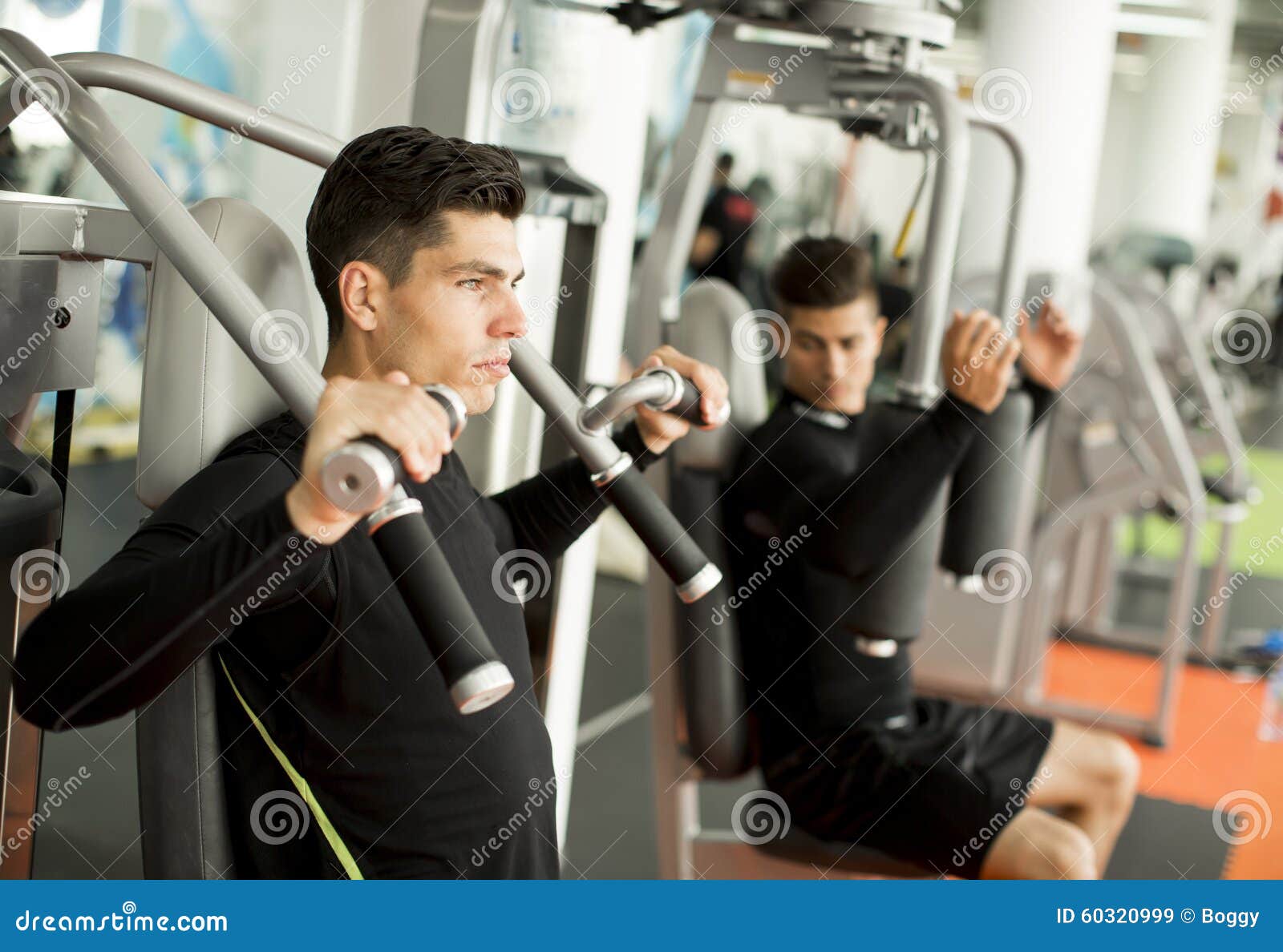 Young man in the gym stock image. Image of sportwear - 60320999