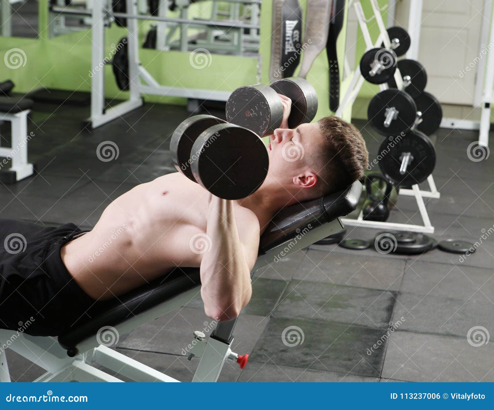 The young man in the gym stock photo. Image of motivation - 113237006