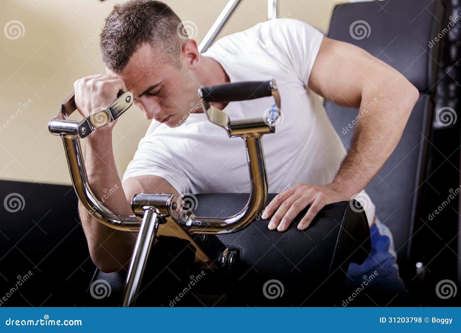 Young man in the gym stock photo. Image of healthy, fitness - 31203798
