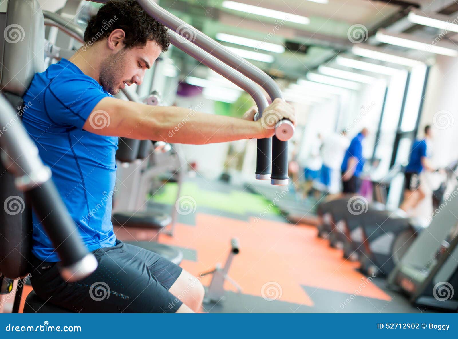 Young man in the gym stock photo. Image of recreation - 52712902