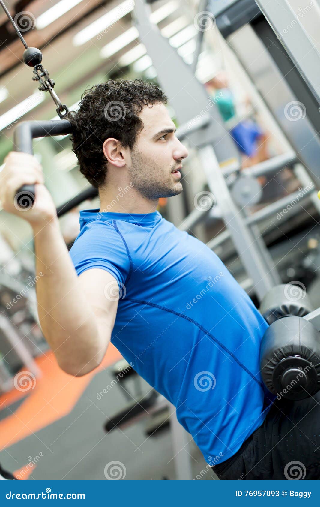 Young man in the gym stock image. Image of sport, attractive - 76957093