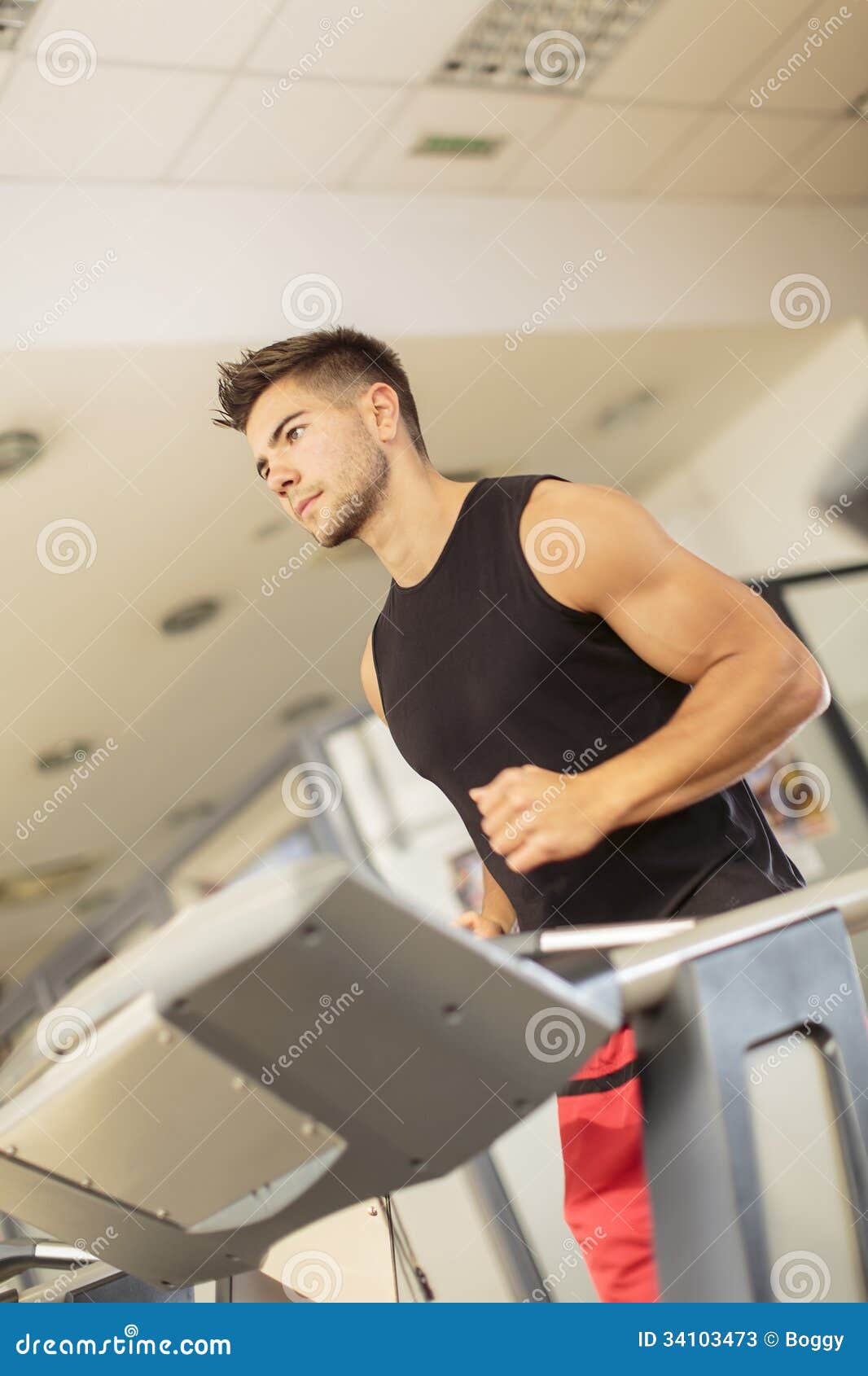 Young man in the gym stock image. Image of cardio, lifestyle - 34103473