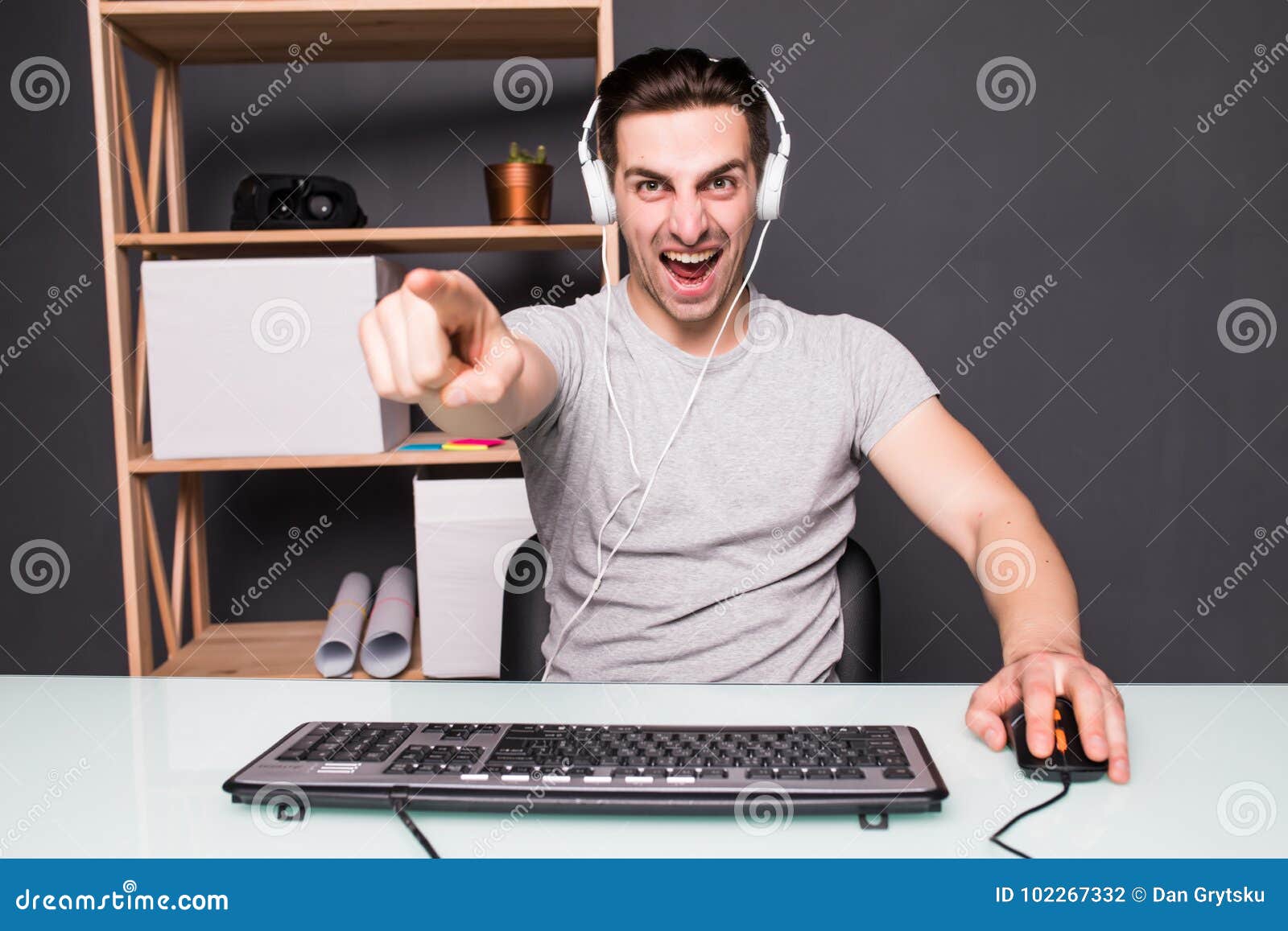 Young Man or Hacker in Headset and Eyeglasses with Pc Computer Playing ...