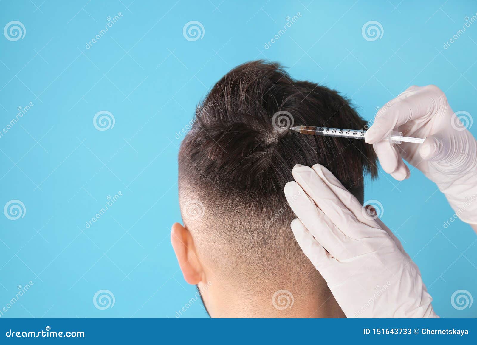 Young Man with Hair Loss Problem Receiving Injection on Color ...