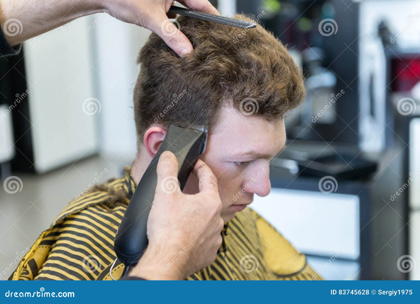 Young Man on a Haircut in the Barber Shop Stock Photo - Image of hair ...