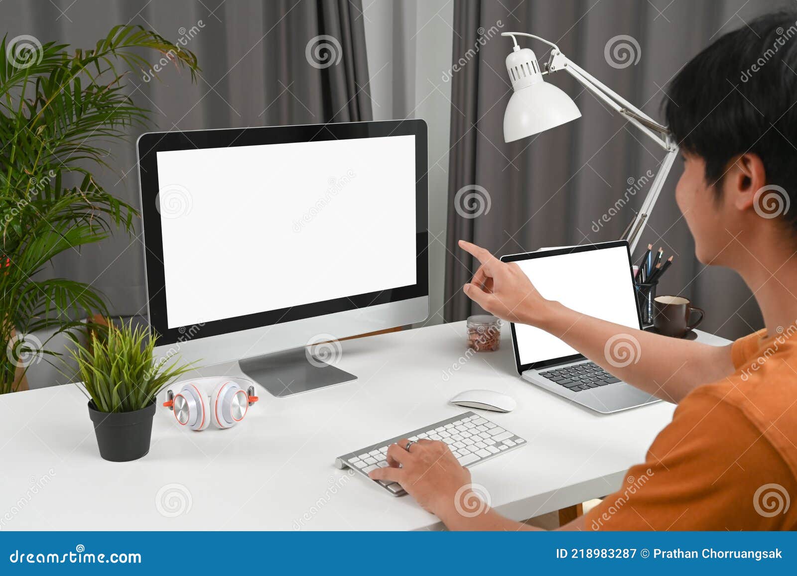 Young Man Hand Pointing on Screen of Computer while Siting in Home ...