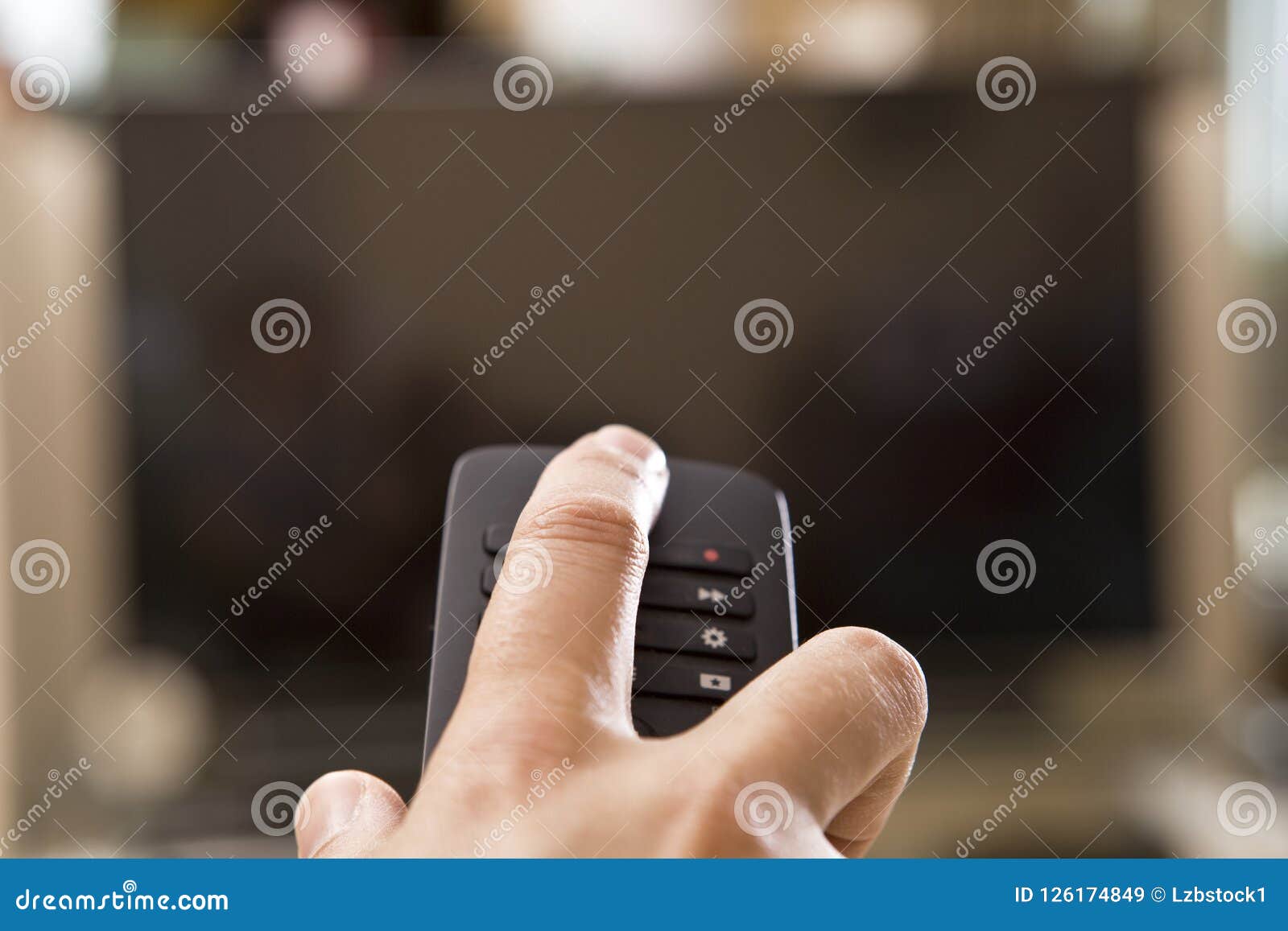 Young Man Hand with Remote Changes Channels Stock Image - Image of ...