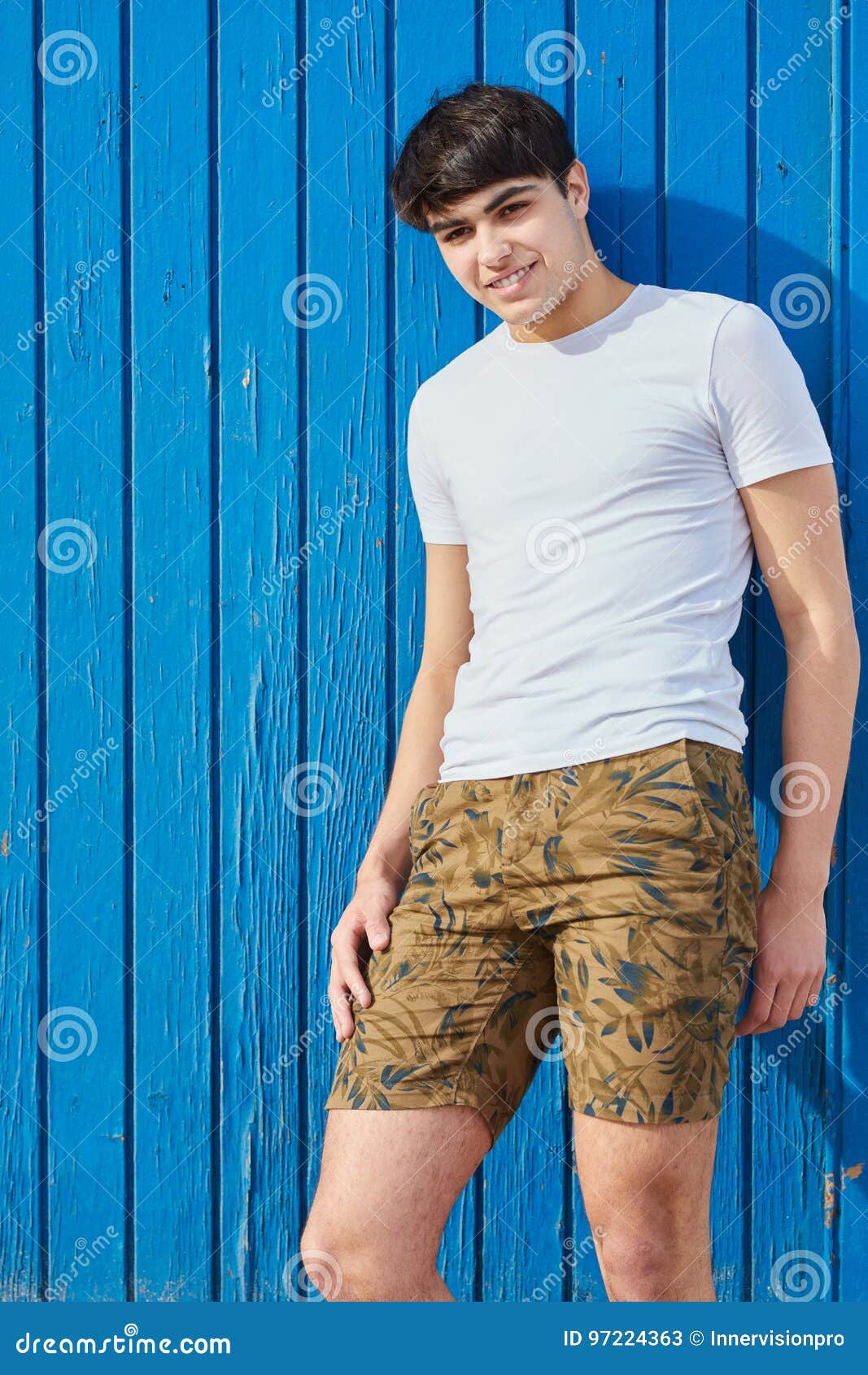 Young Man Handsome Man Standing in Laid Back Pose Smiling Stock Image ...