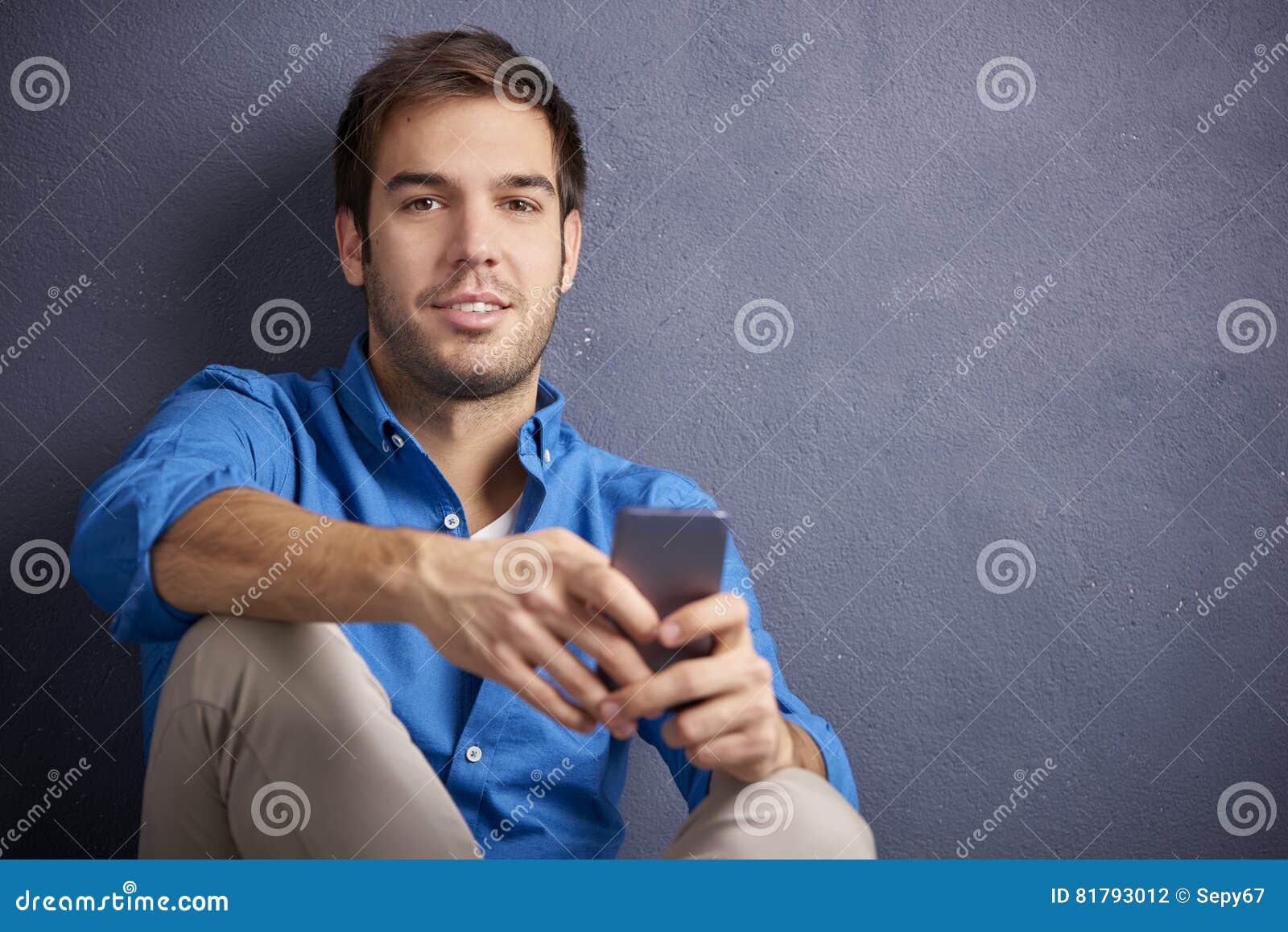Young man with handy stock photo. Image of camera, handsome - 81793012