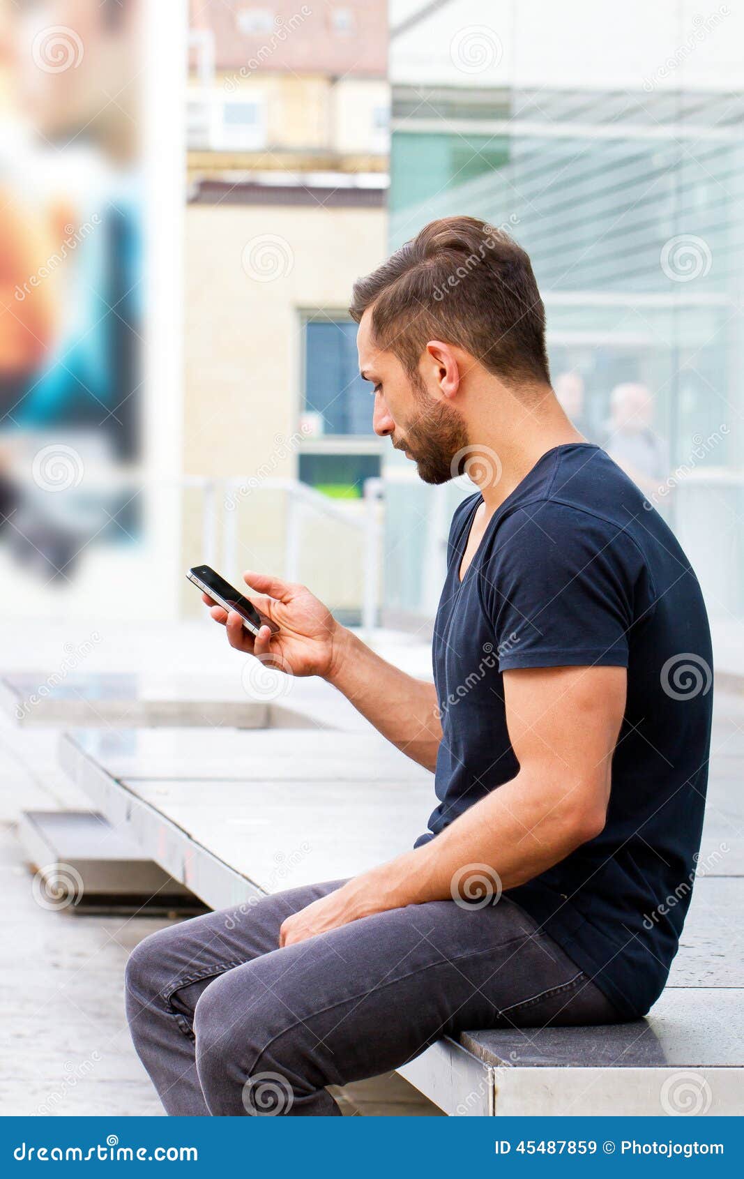 Young man on handy stock image. Image of home, dark, beauty - 45487859