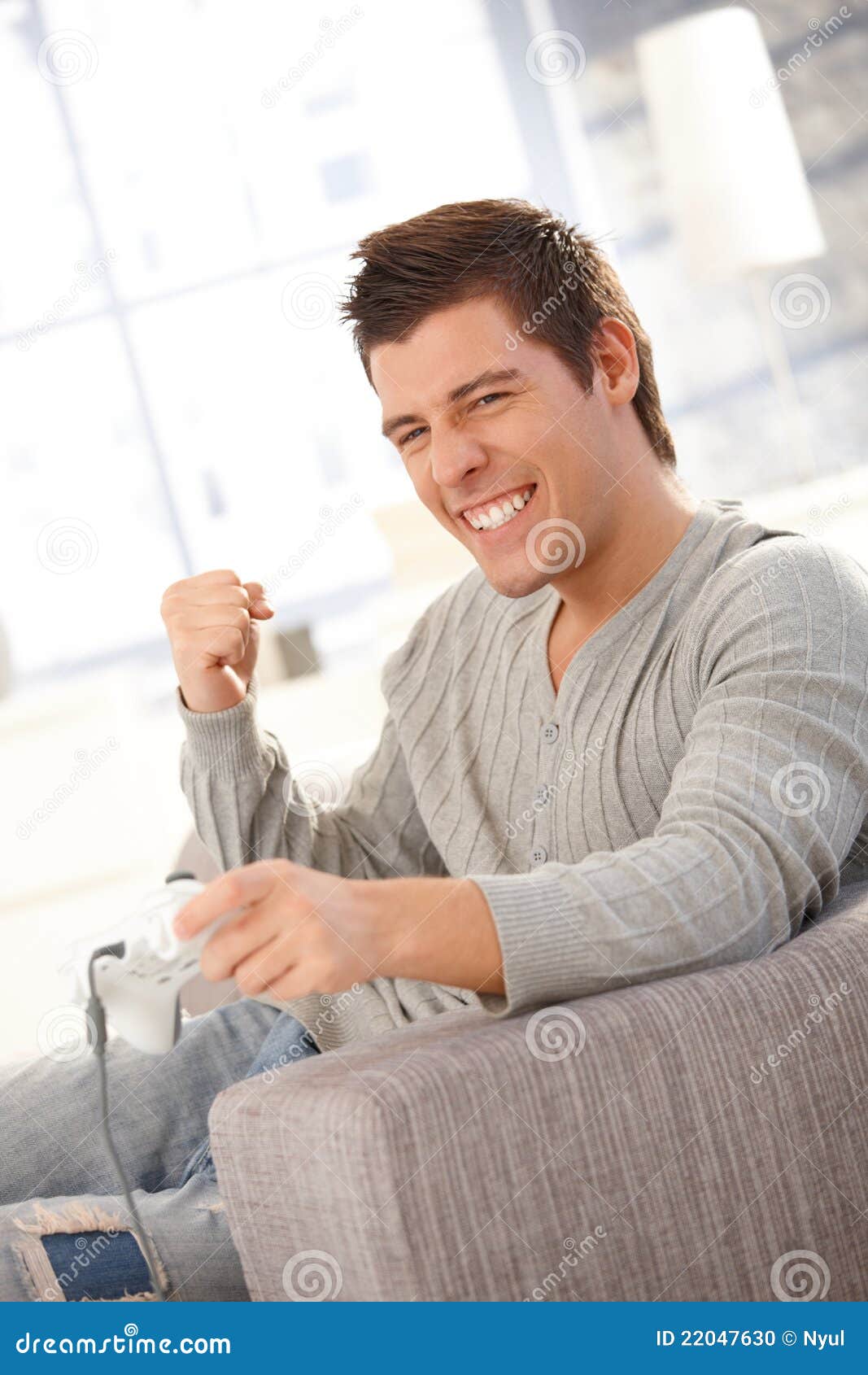 Young Man Happy about Computer Game Stock Photo - Image of american ...