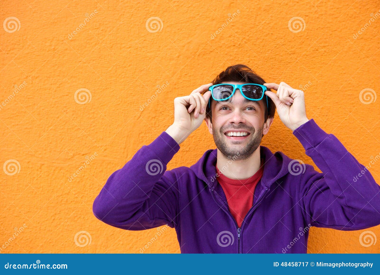 Young Man with Happy Expression on Face Looking Up Stock Image - Image ...