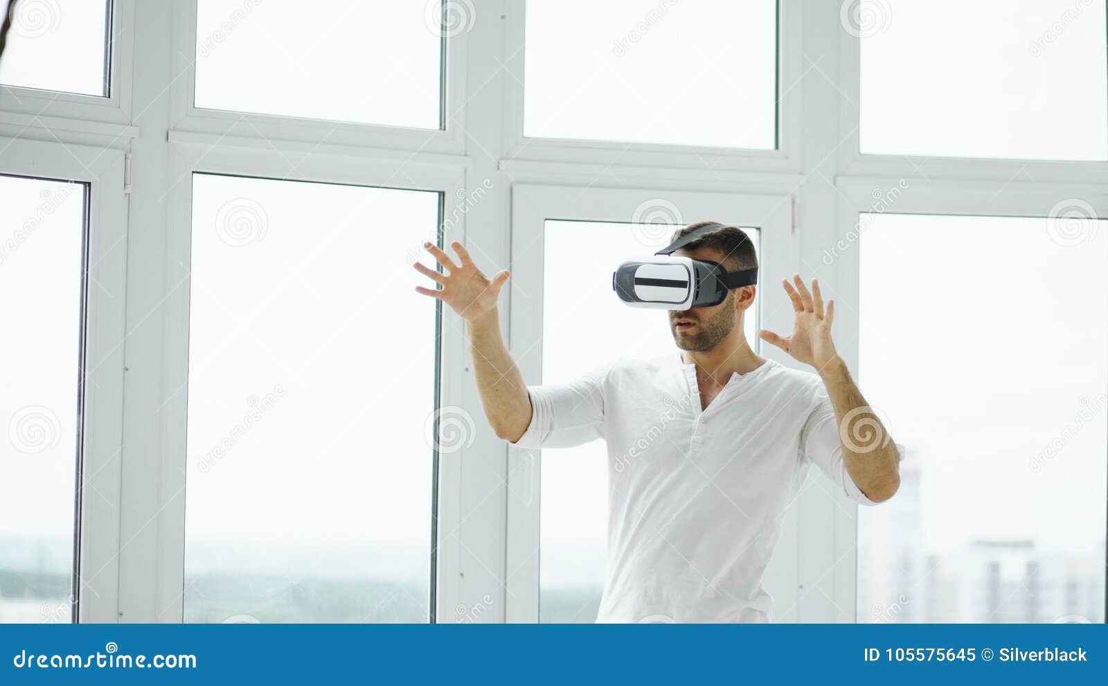 Young Man Have VR Experience with Virtual Reality Headset Using Hands ...