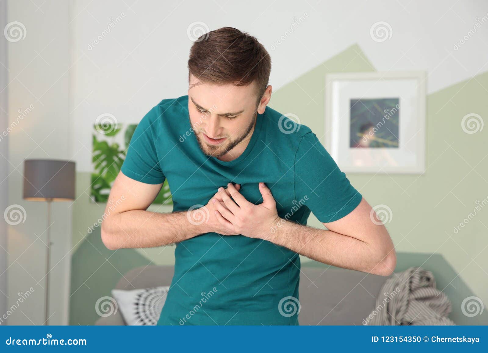 Young Man Having Heart Attack Stock Photo - Image of cardiovascular ...