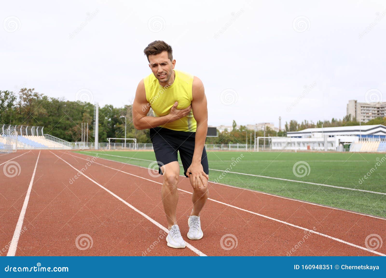 Young Man Having Heart Attack while Running Stock Image - Image of ...