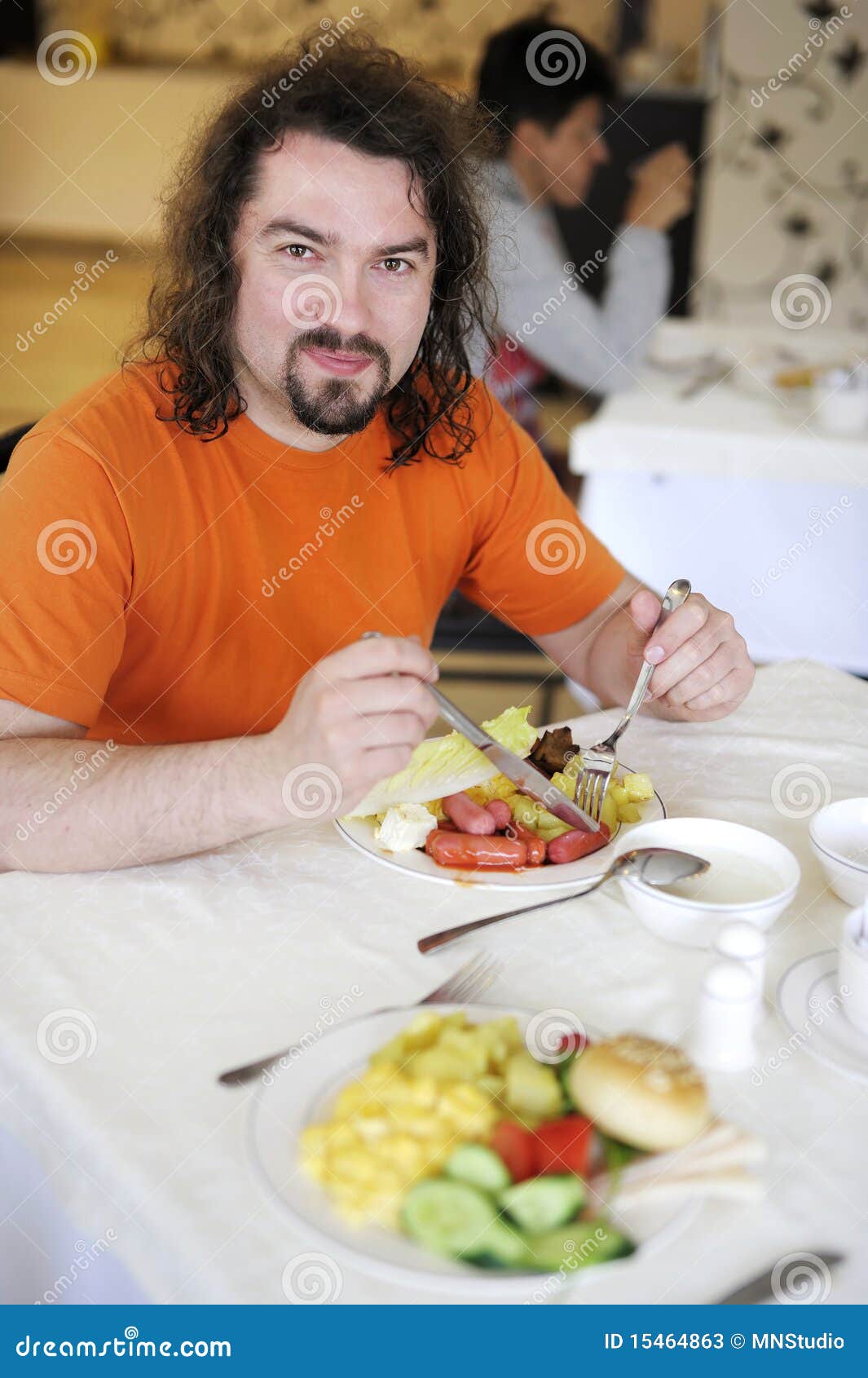 Young Man Having His Breakfast Stock Image - Image of sunny, relax ...