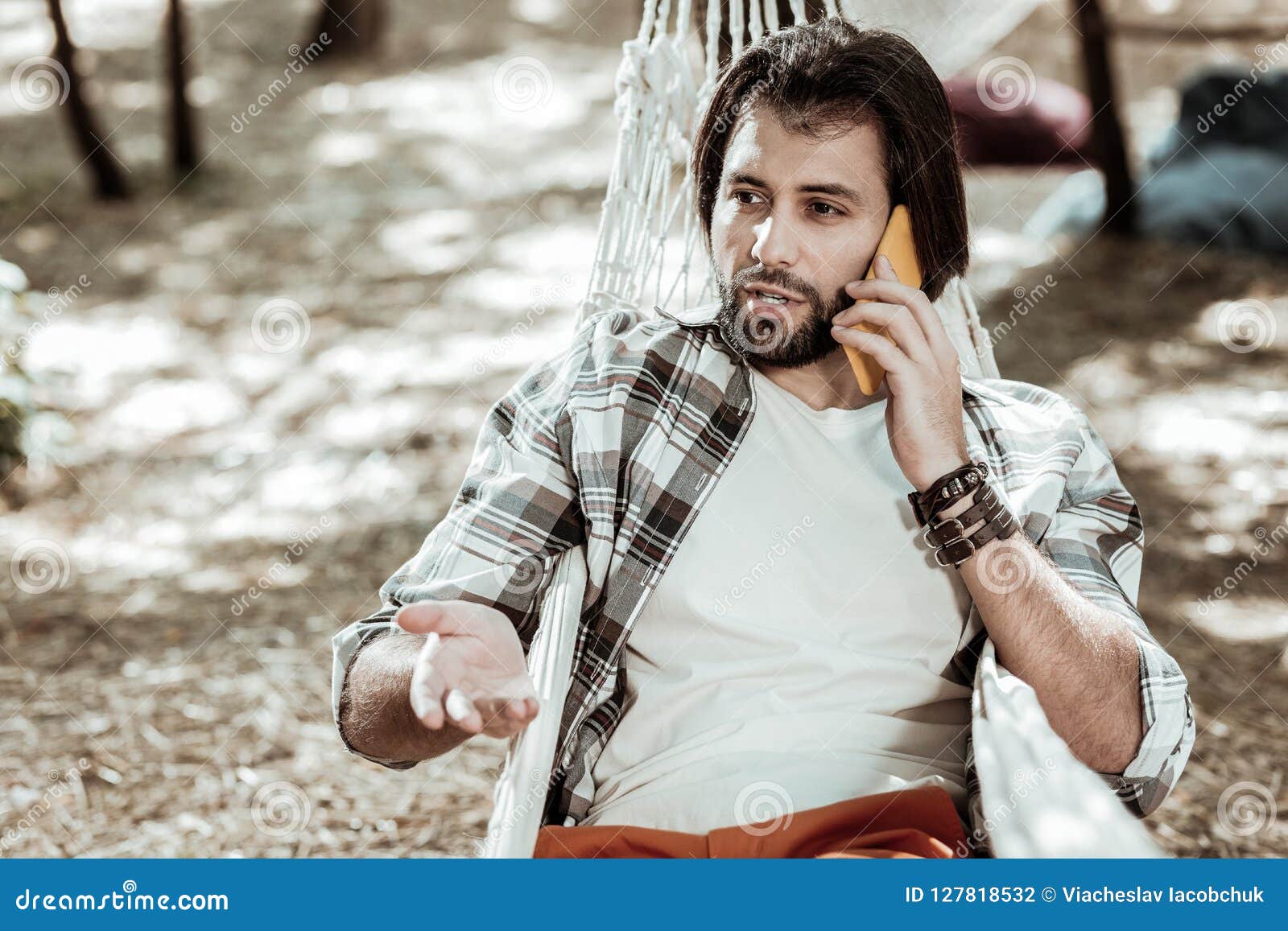 Young Man Having an Important Phone Call Stock Photo - Image of call ...