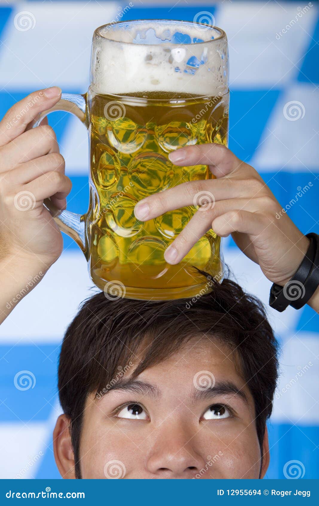 Young Man Having Oktoberfest Beer Stein on Head Stock Photo - Image of ...