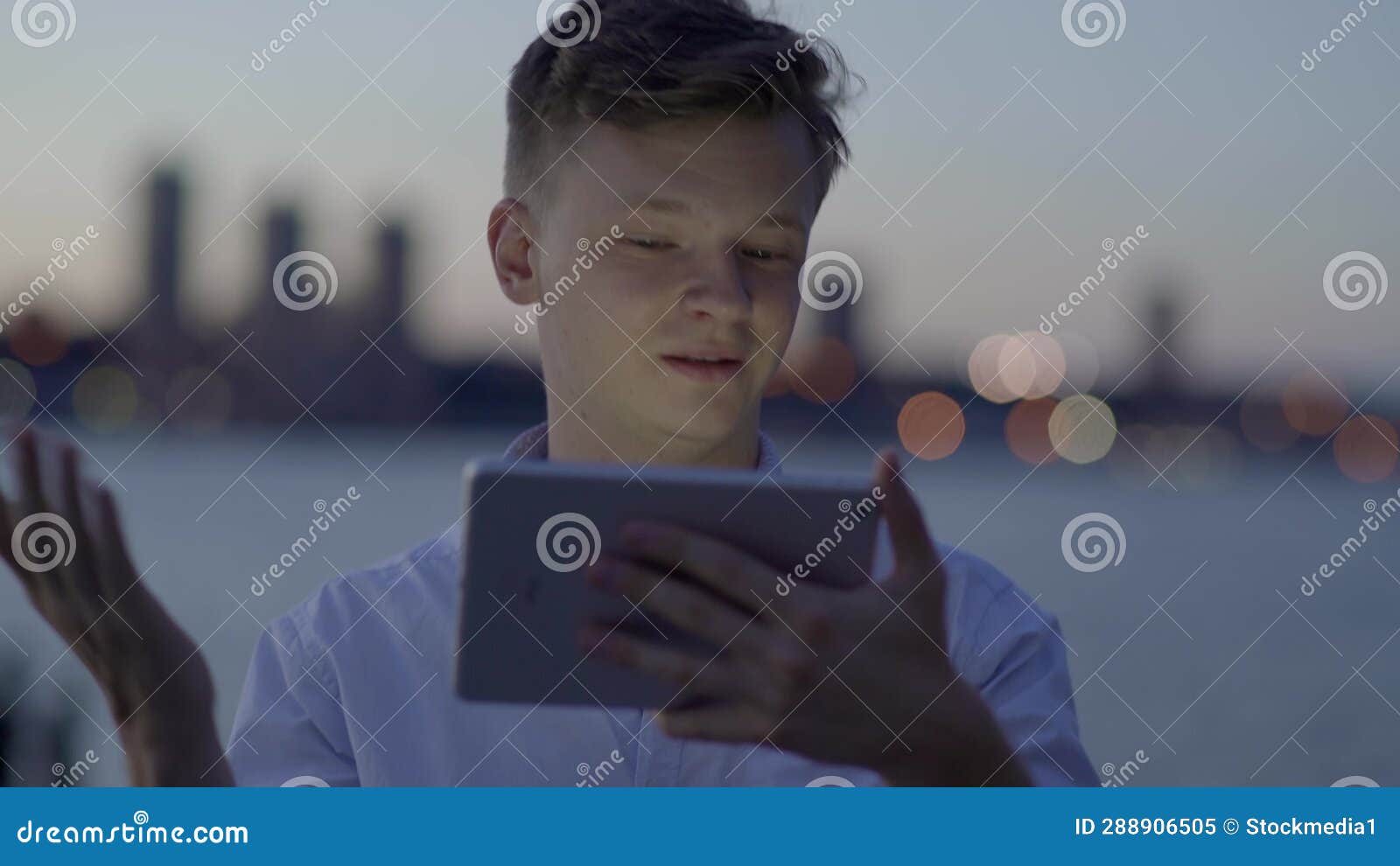 Young Man Having a Video Call on Mobile Tablet Screen Talking Stock ...