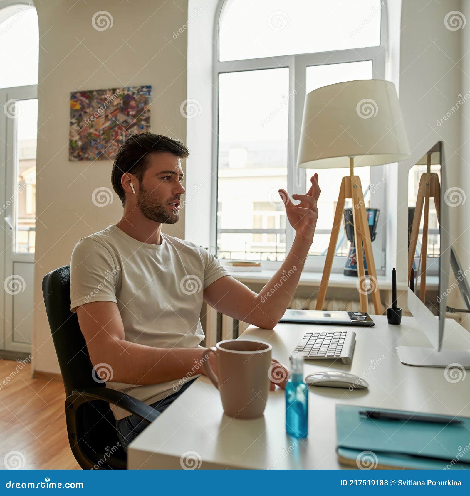 Young Man is Having a Video Call from Work, Discussing Project Stock ...