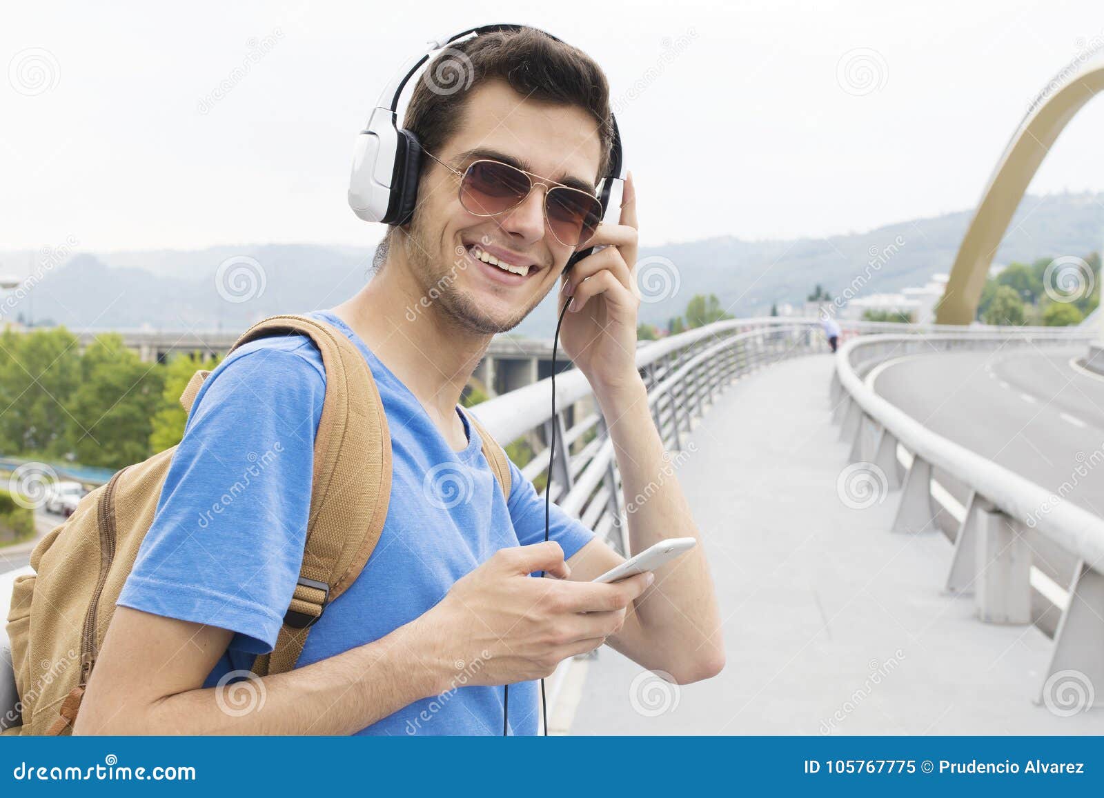 Young Man with the Headset and the Phone Stock Image - Image of ...