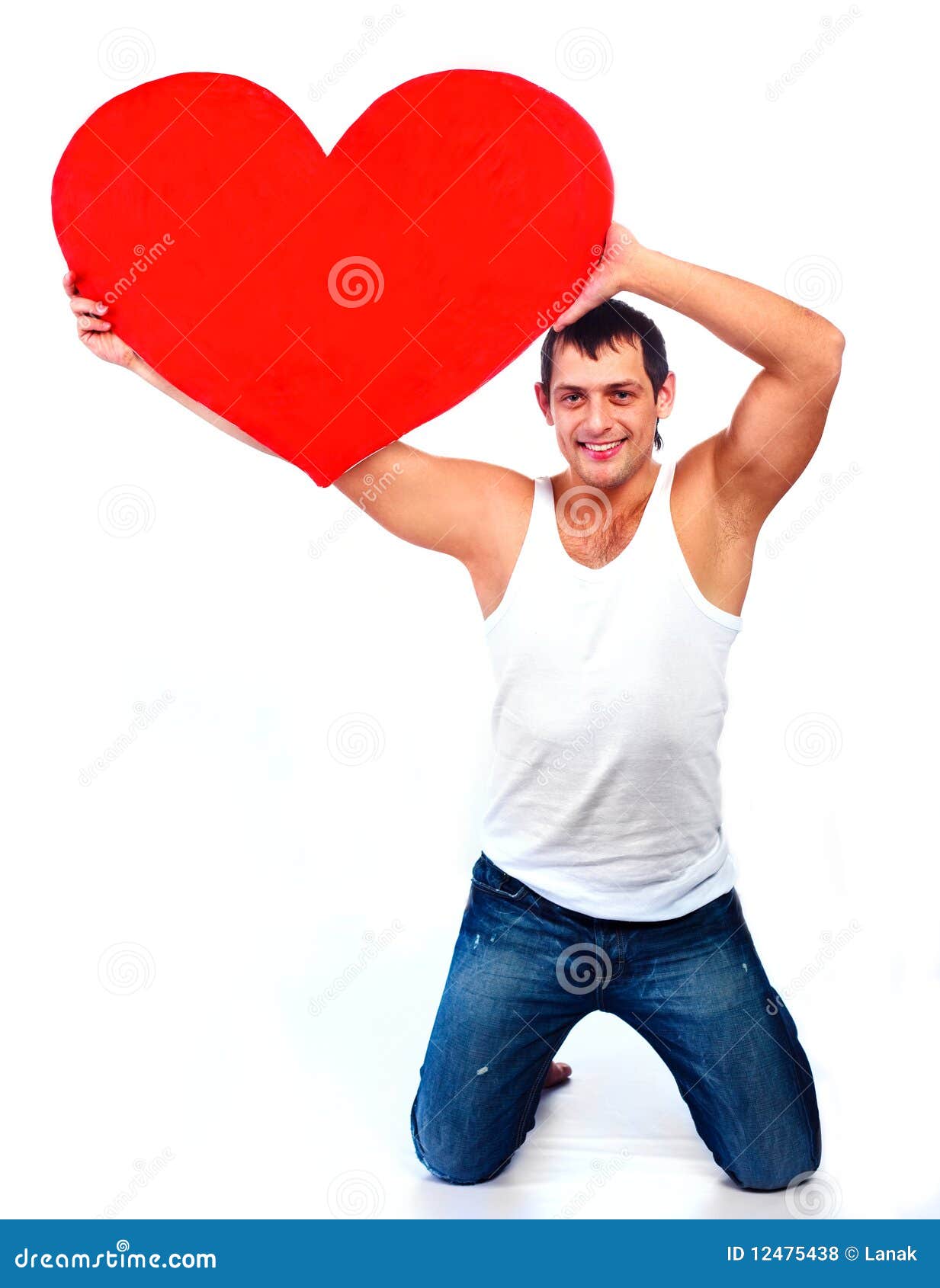 Young man with a heart stock photo. Image of carry, cupid - 12475438
