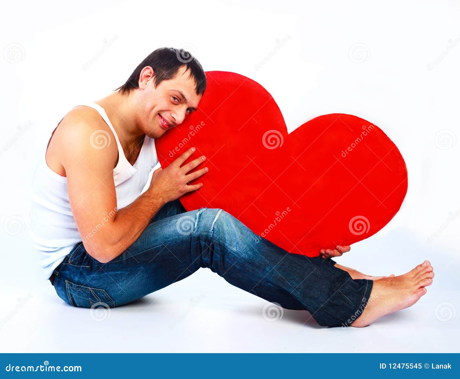 Young man with a heart stock image. Image of handsome - 12475545