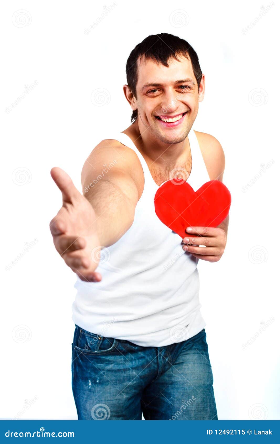 Young man with a heart stock image. Image of jeans, laugh - 12492115