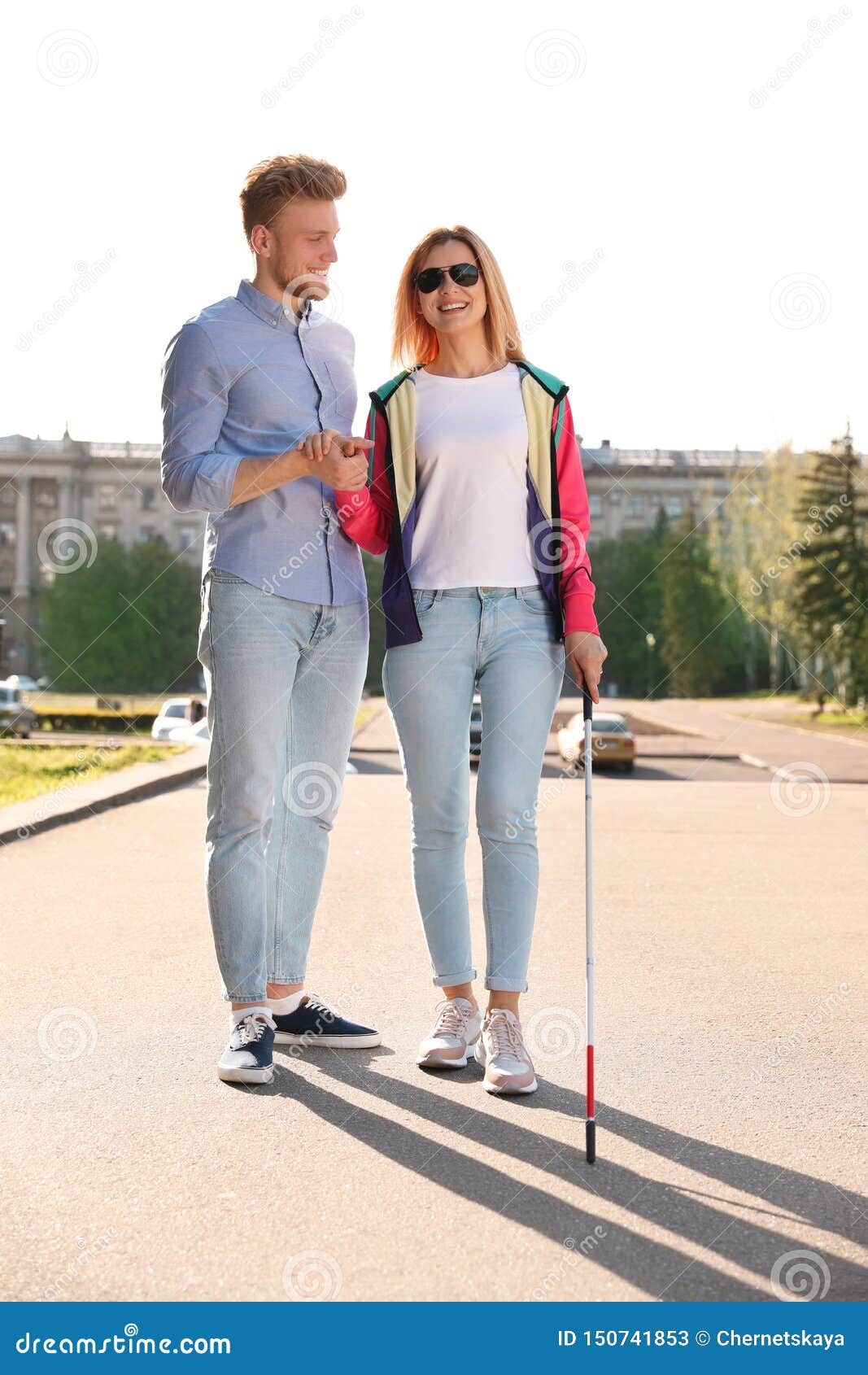 Young Man Helping Blind Person with Long Cane Walking Stock Image ...