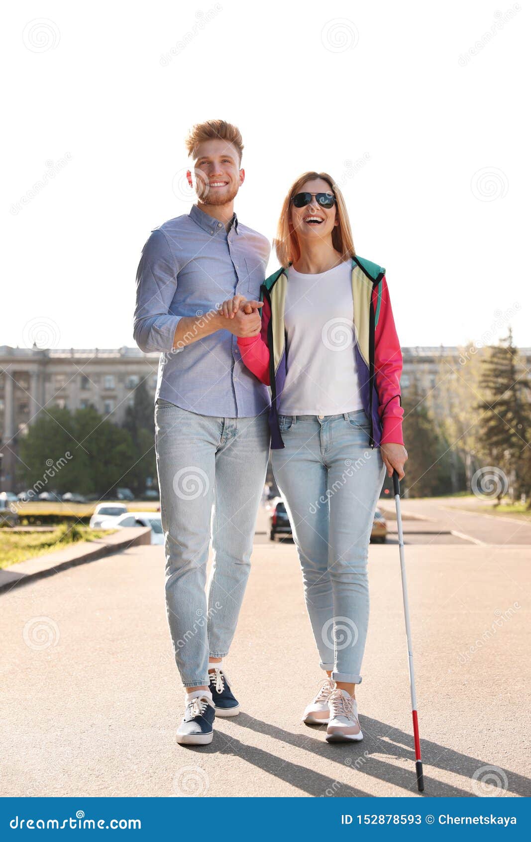 Young Man Helping Blind Person with Long Cane Walking Stock Image ...