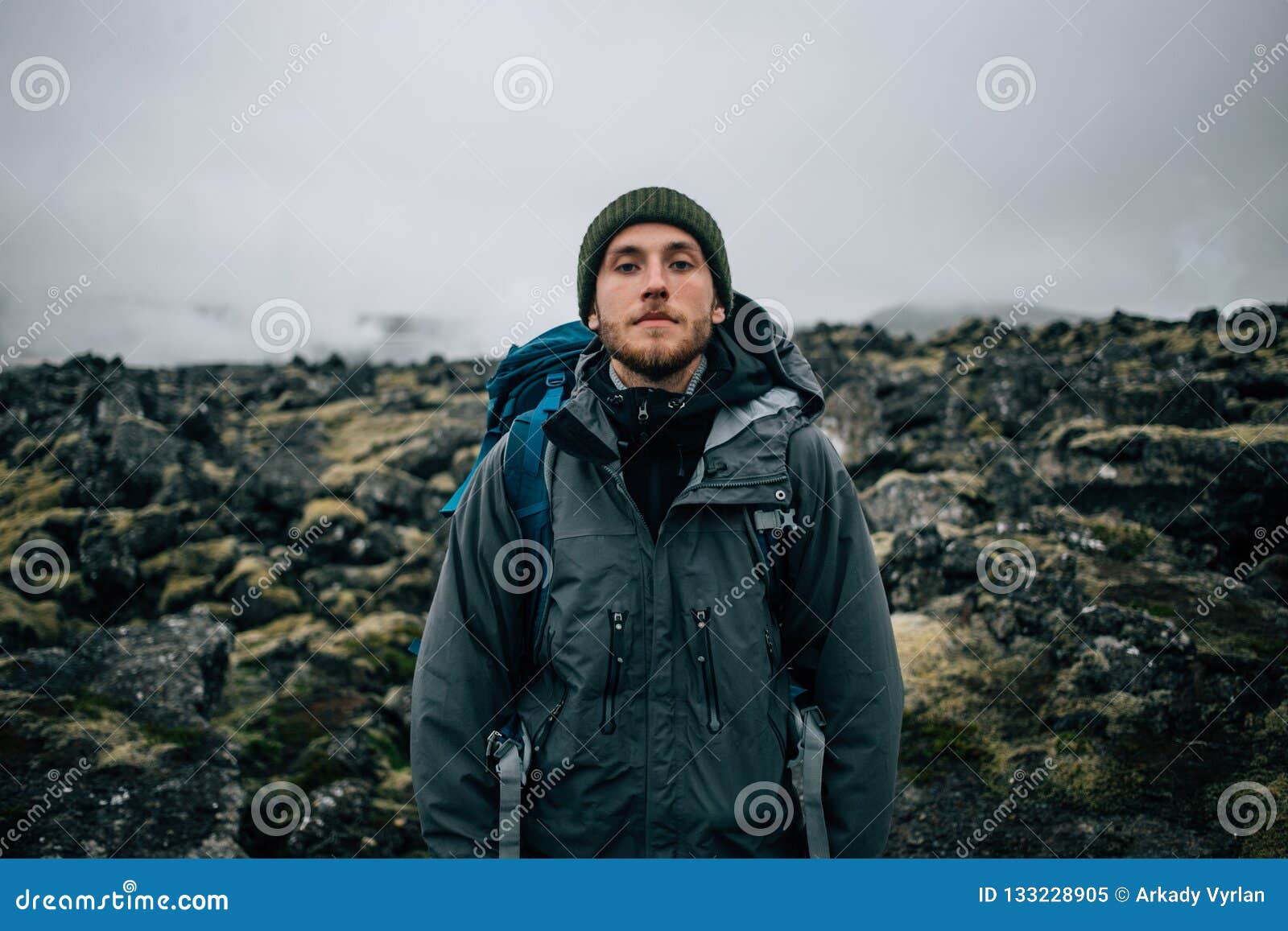 Young Man Hikes Through Rough Iceland Terrain Stock Image Image Of