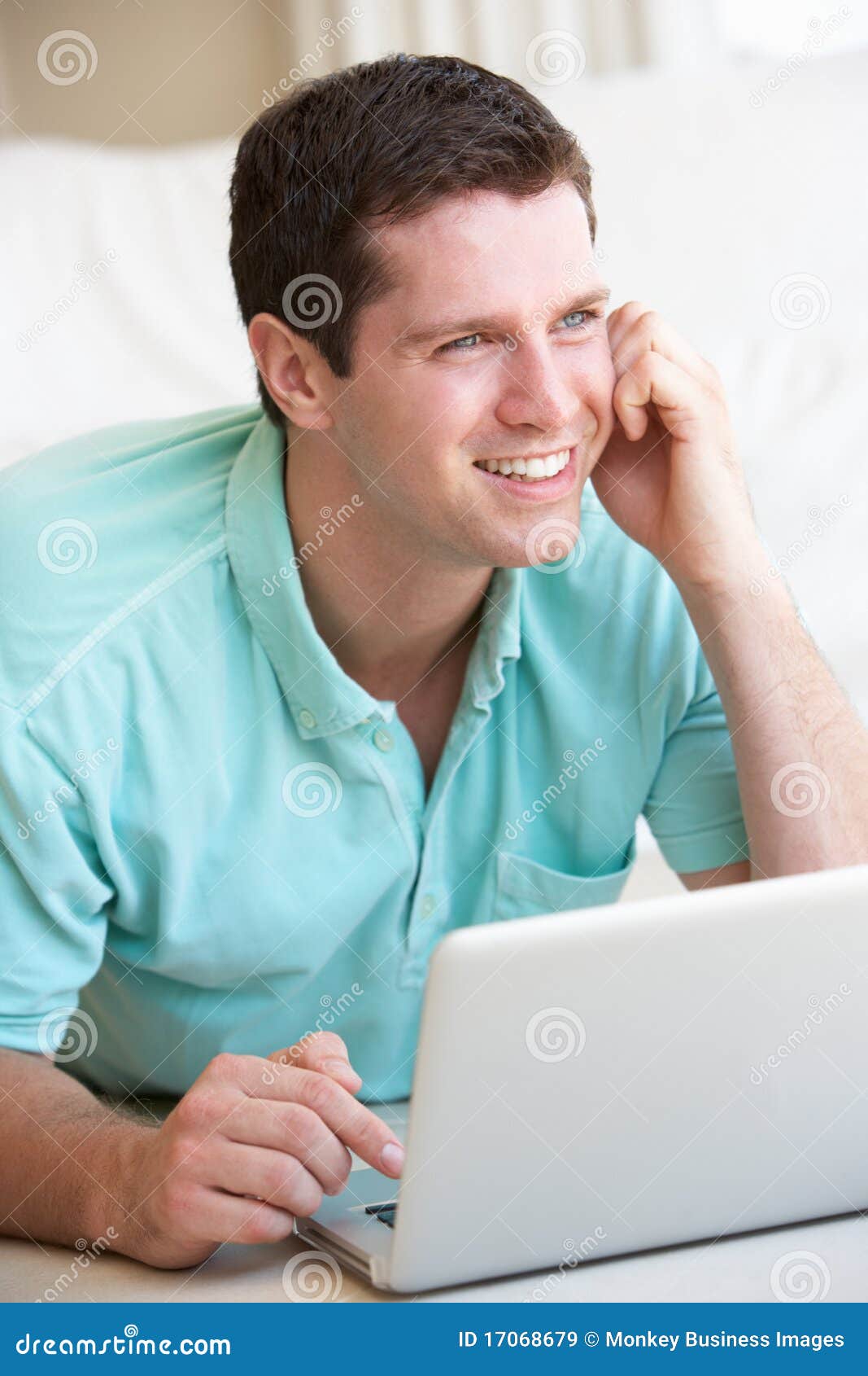 Young Man on His Laptop Computer Stock Image - Image of smiling, happy ...