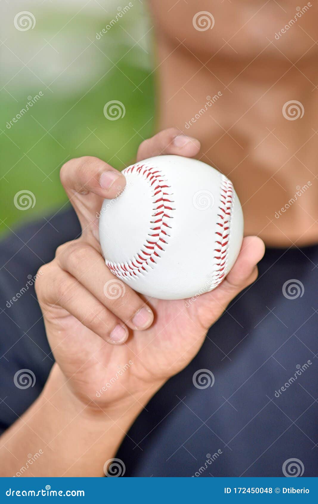 A Young Man Holding Baseball Stock Photo - Image of sports, holding ...