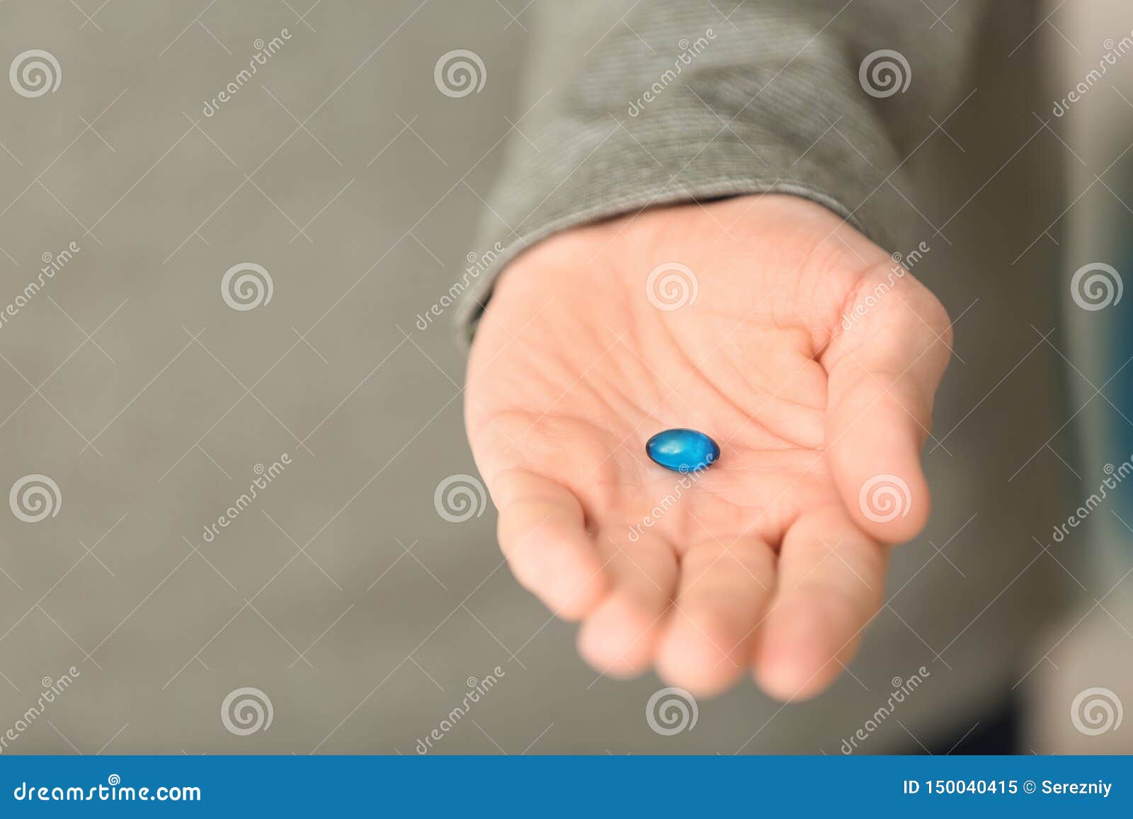 Young Man Holding Blue Pill, Closeup Stock Image - Image of medication ...