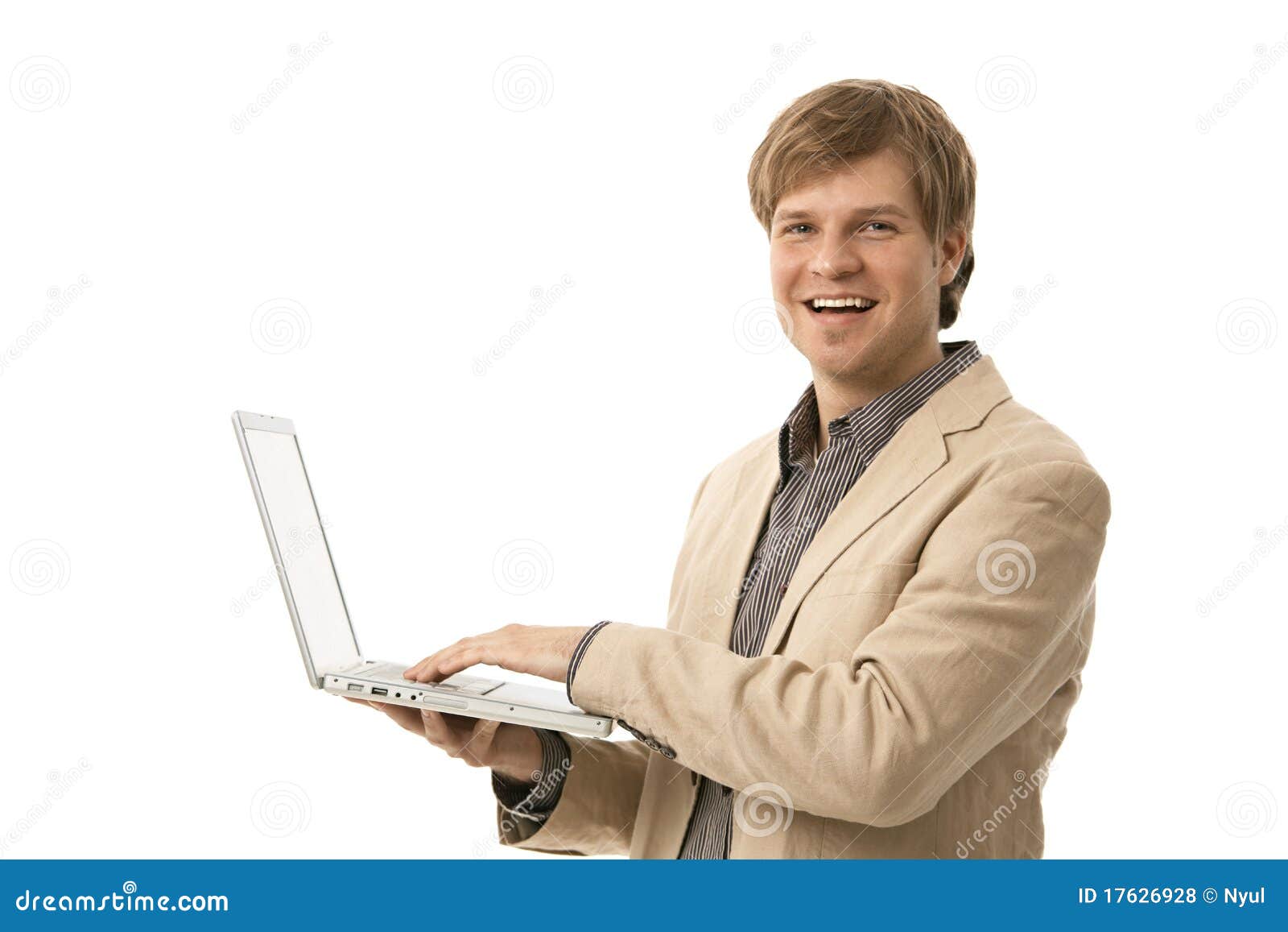 Young man holding computer stock photo. Image of alone - 17626928