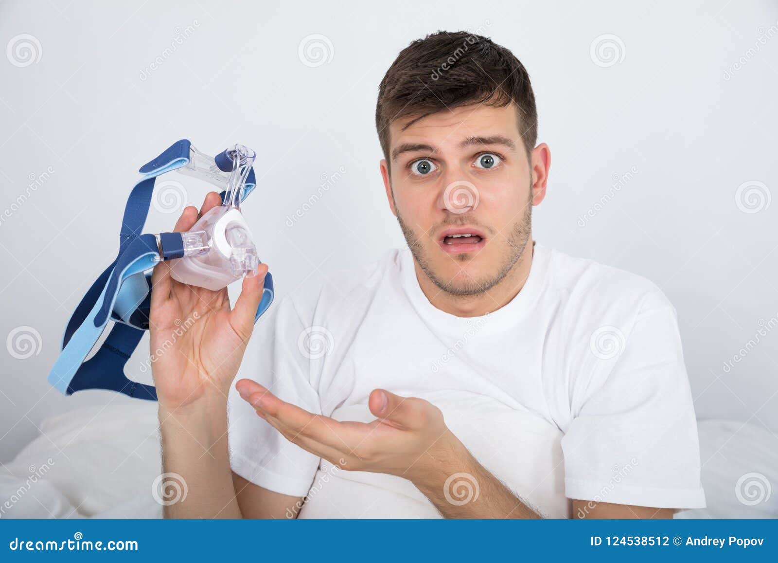 Young Man Holding CPAP Machine Stock Photo - Image of health, breathing ...