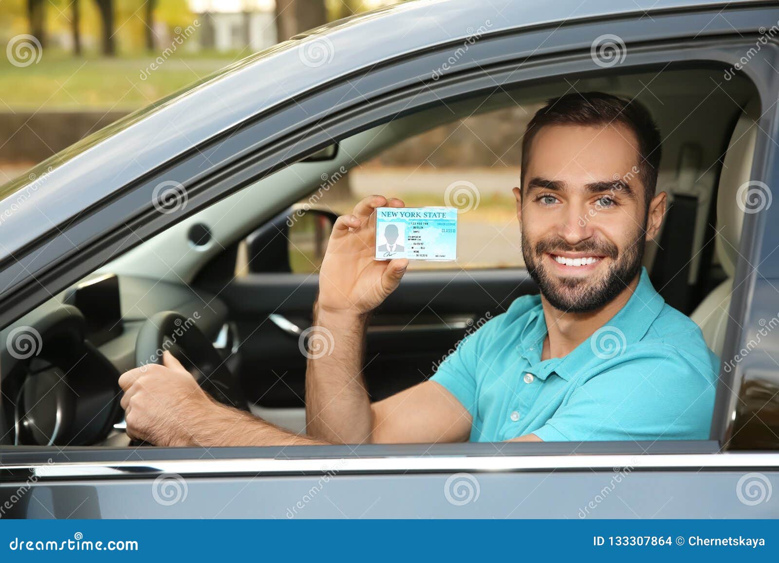 Young Man Holding Driving License Stock Photo - Image of safety ...