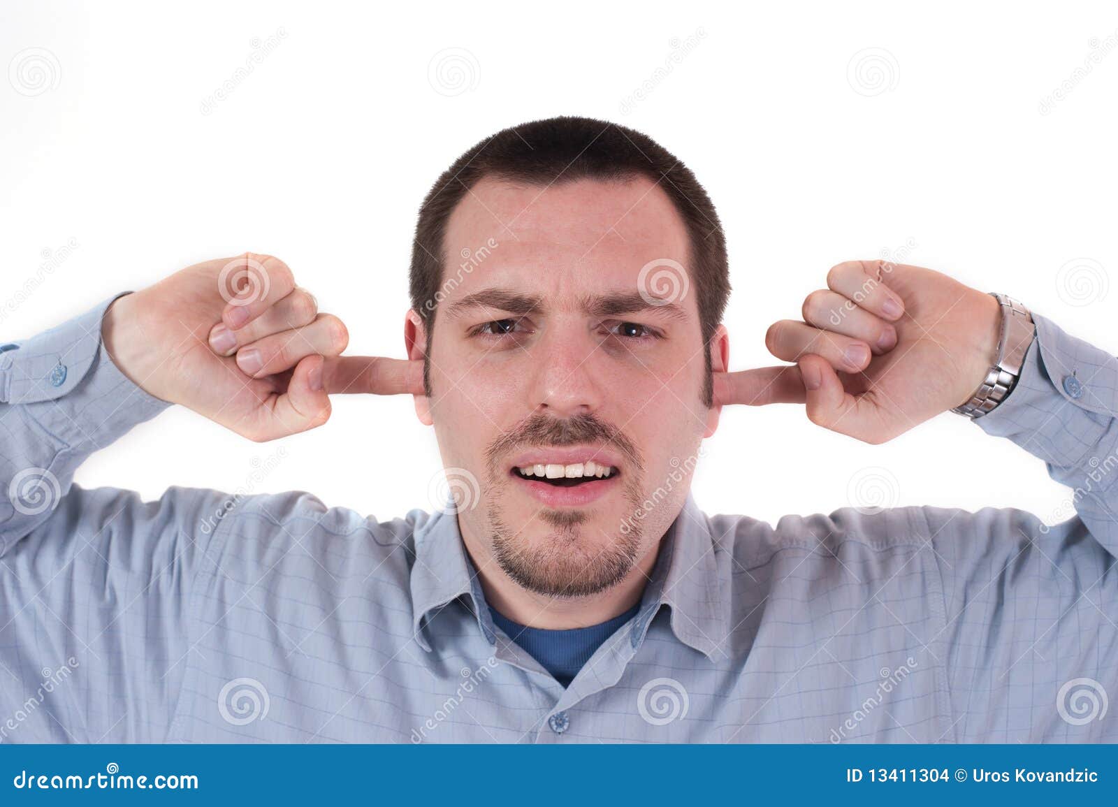 Young Man Holding Fingers in Ears, Shutting Them Stock Photo - Image of ...