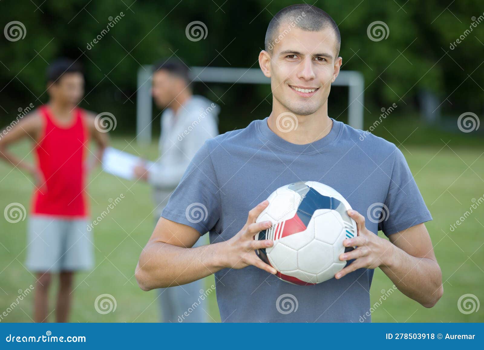 Young Man Holding Football during Training Stock Photo - Image of ...
