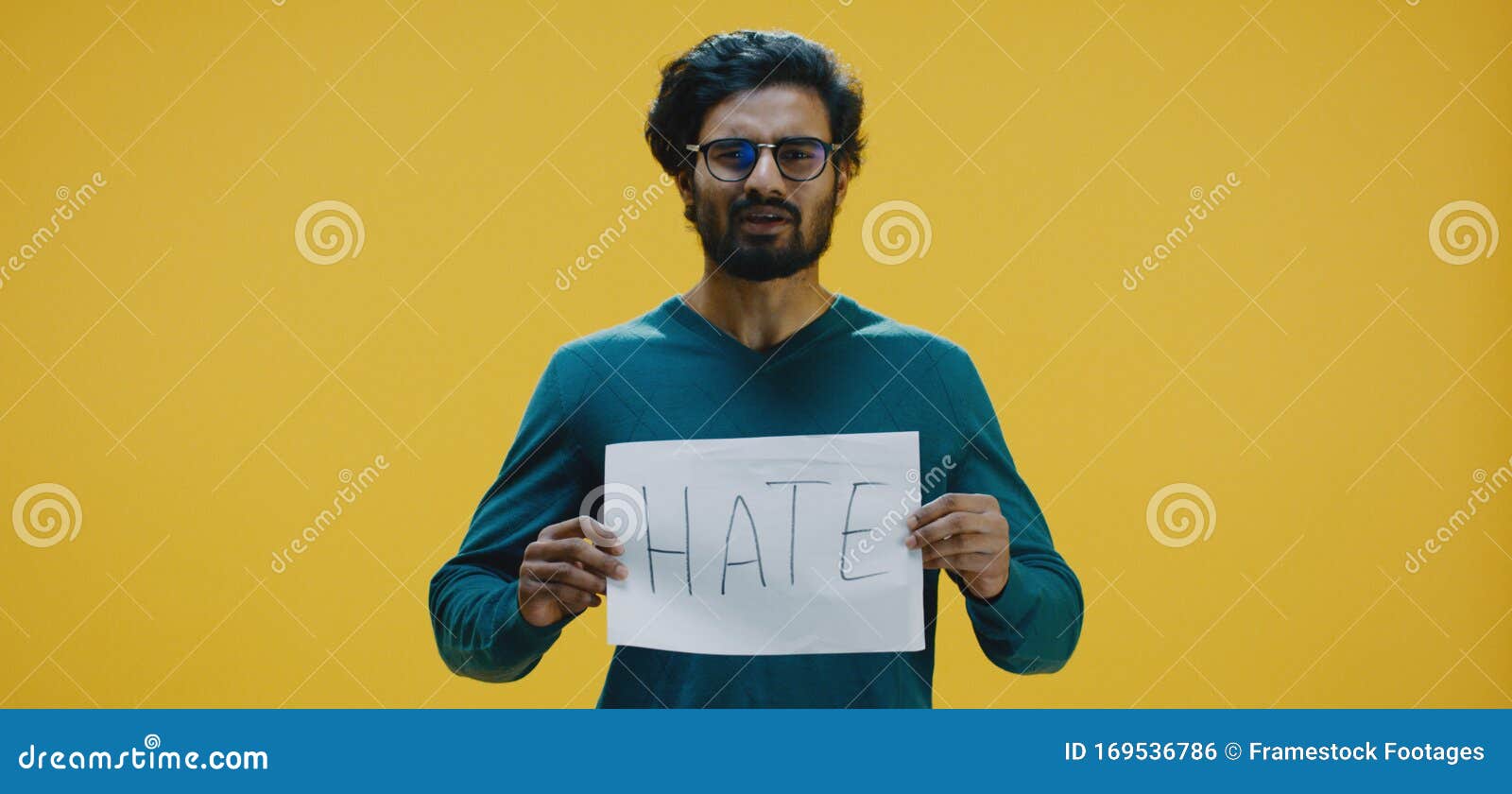 Young Man Holding Hate Sign and Talking Stock Photo - Image of emotions ...