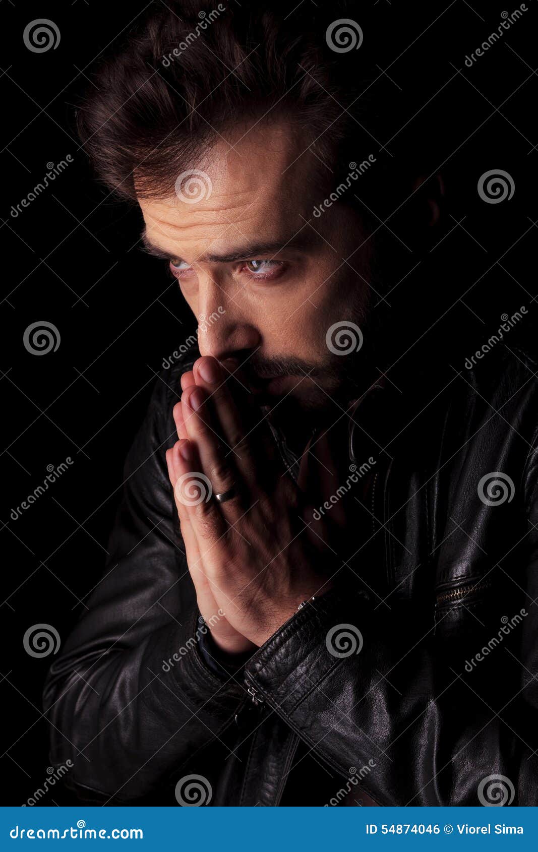 Young Man Holding His Hands Together Praying. Stock Photo - Image of ...