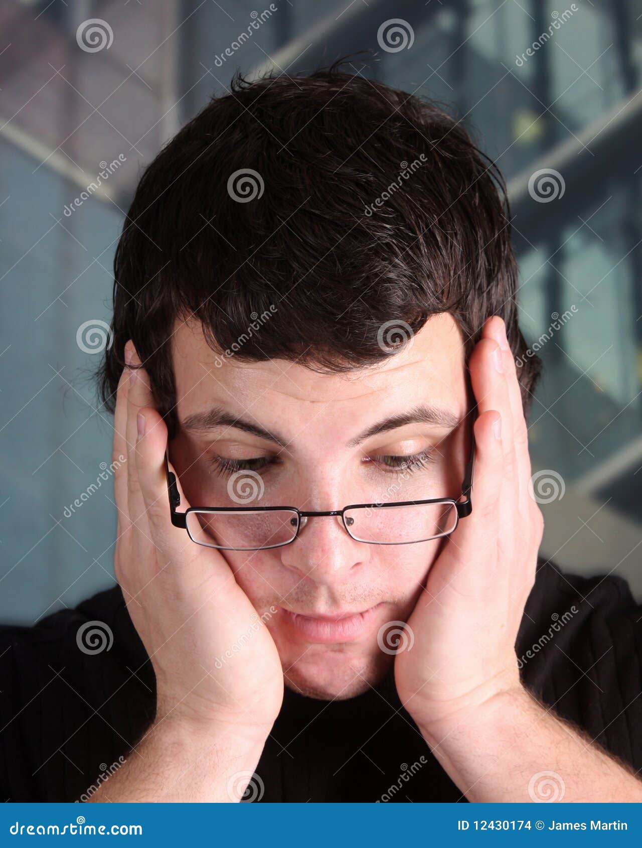 Young man holding his head stock photo. Image of tired - 12430174