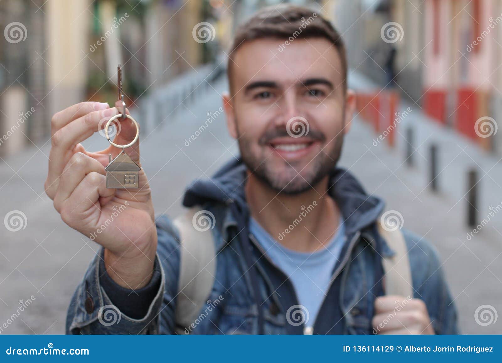 Young Man Holding House Keys Stock Image - Image of friendly, isolated ...
