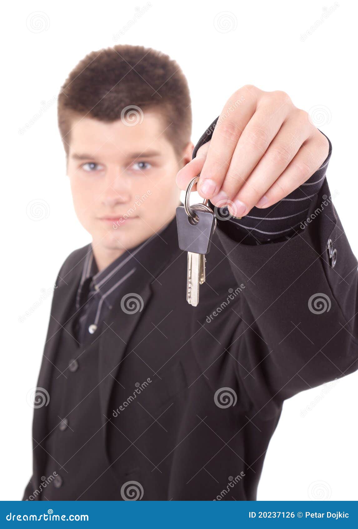 Young man holding keys stock photo. Image of entrepreneur - 20237126