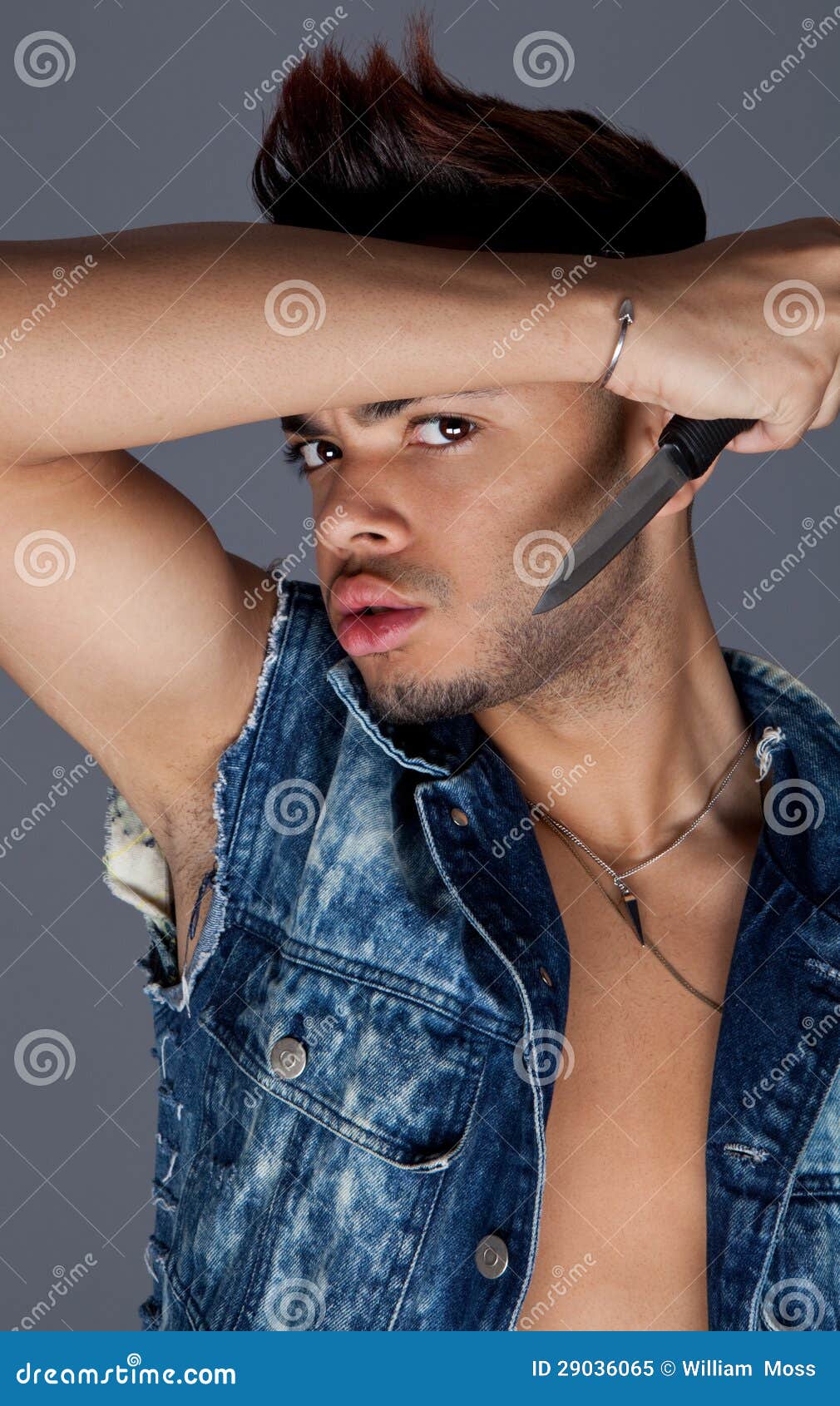 Young Man Holding Knife, Looking Defensive Stock Image - Image of ...