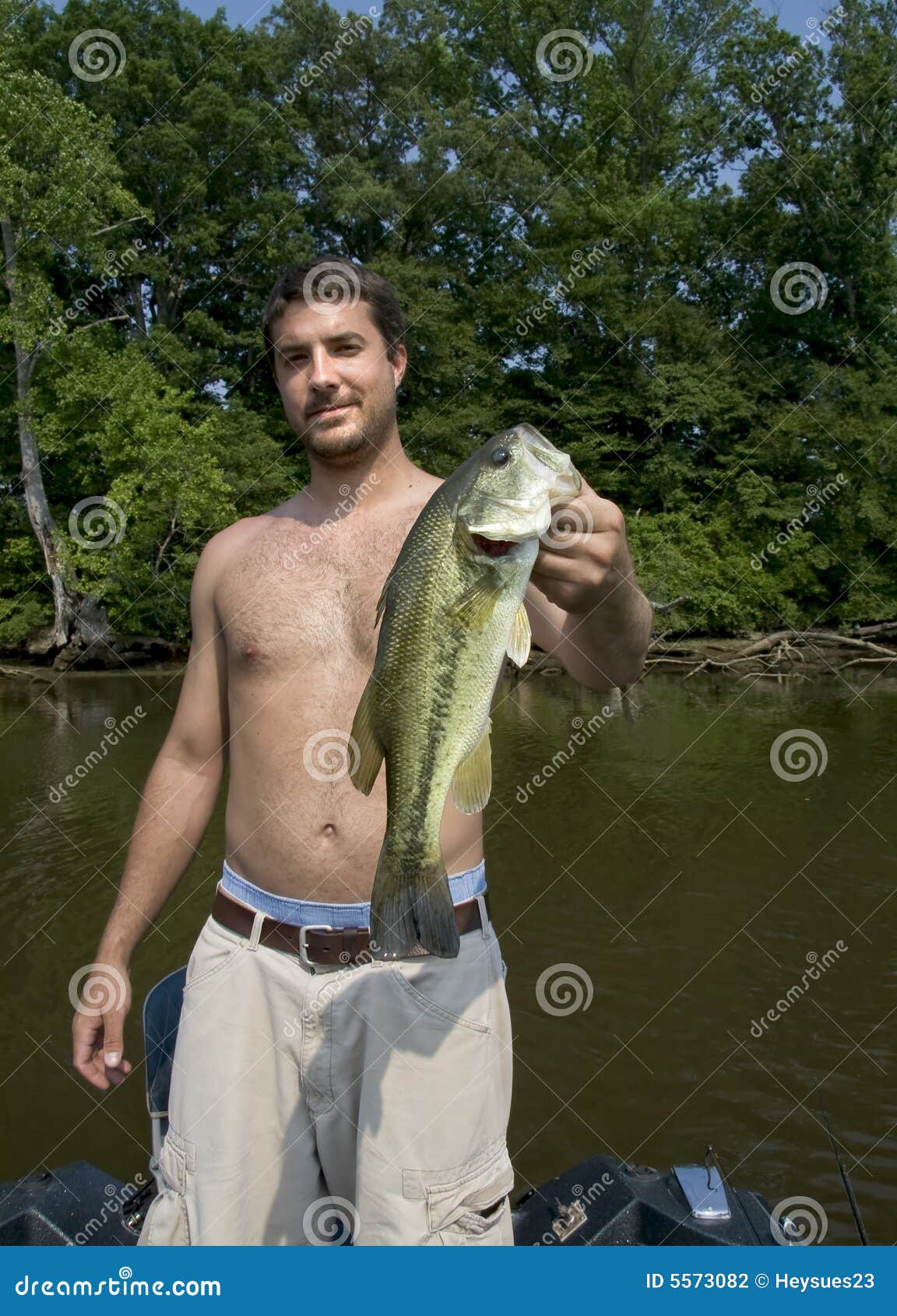 Young Man Holding Large Mouth Bass Stock Photo - Image of line, mouth ...