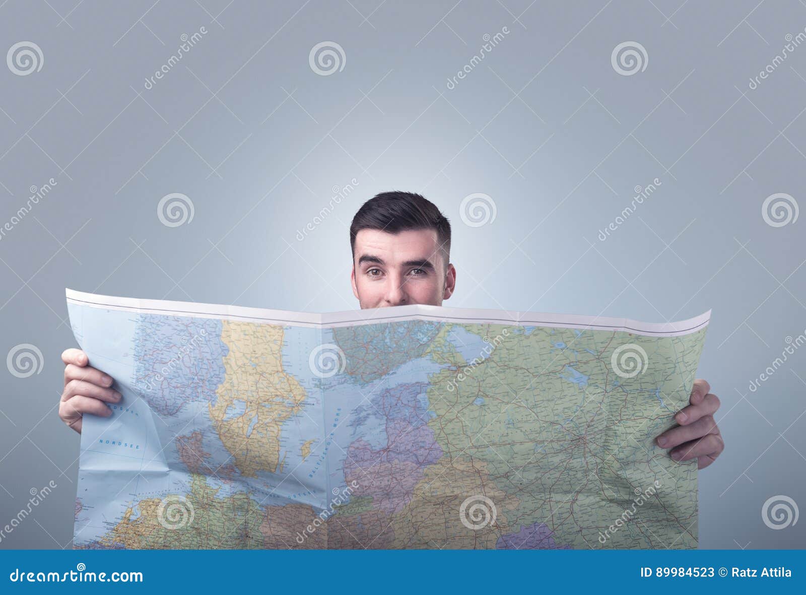 Young man holding map stock image. Image of country, lifestyle - 89984523