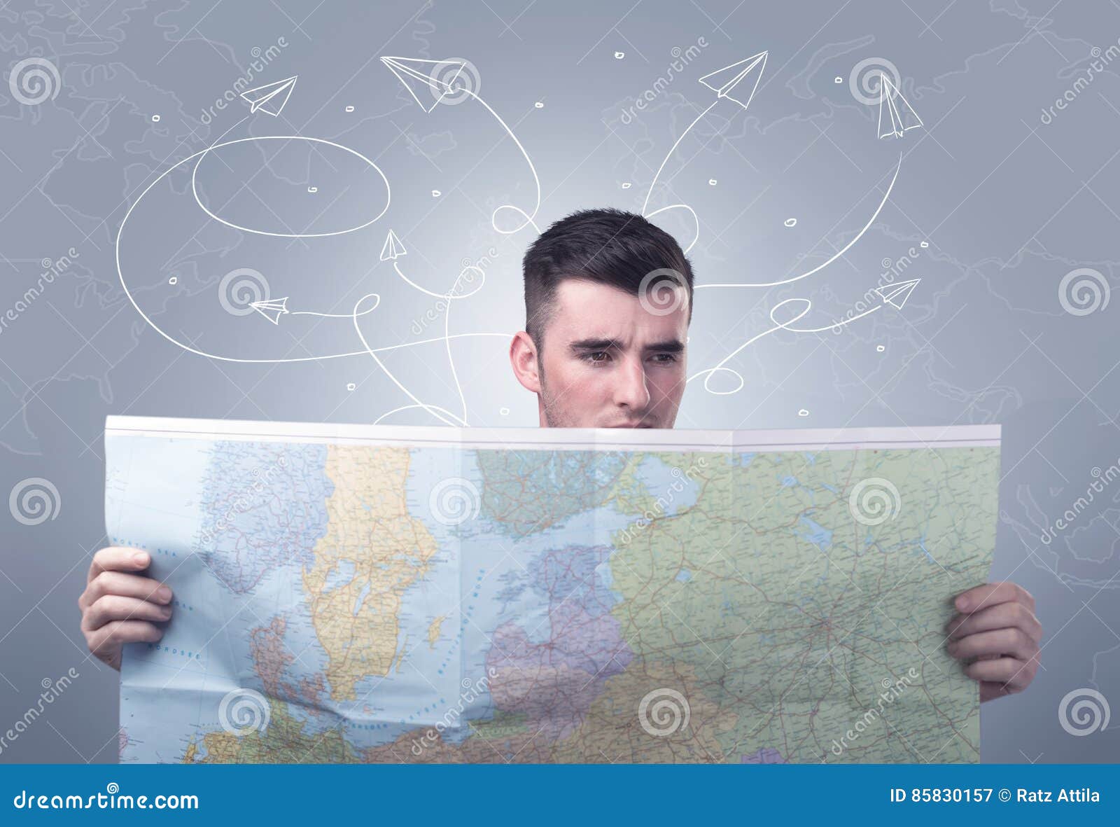 Young man holding map stock image. Image of backpacking - 85830157